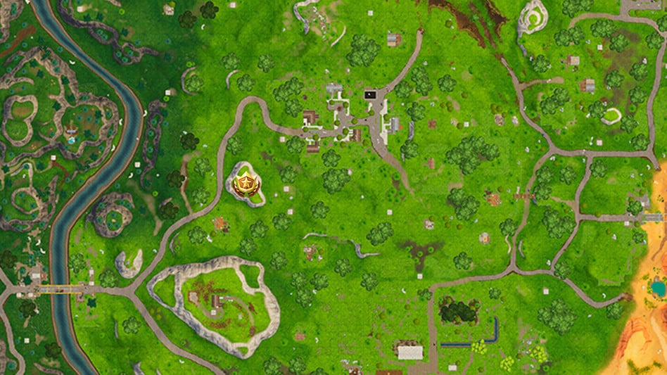 Fortnite : fouiller là où regardent les têtes de pierre, défi - Millenium